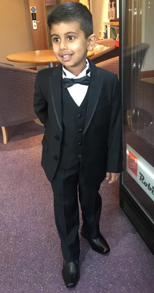 Boys 3 piece black dinner suit with black satin trim by Romano | Wonderland